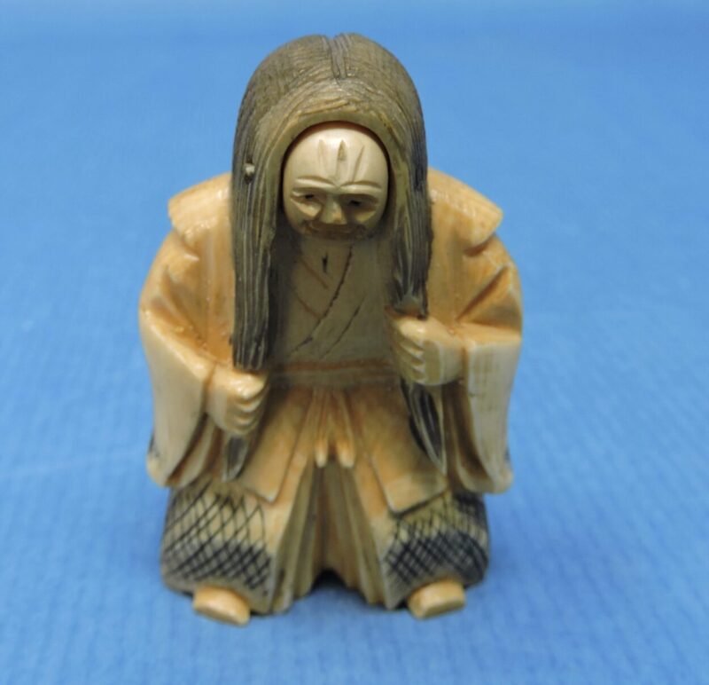 Carved Ivory Netsuke of a Man with Long Hair and Two Faces (Rotatable ...